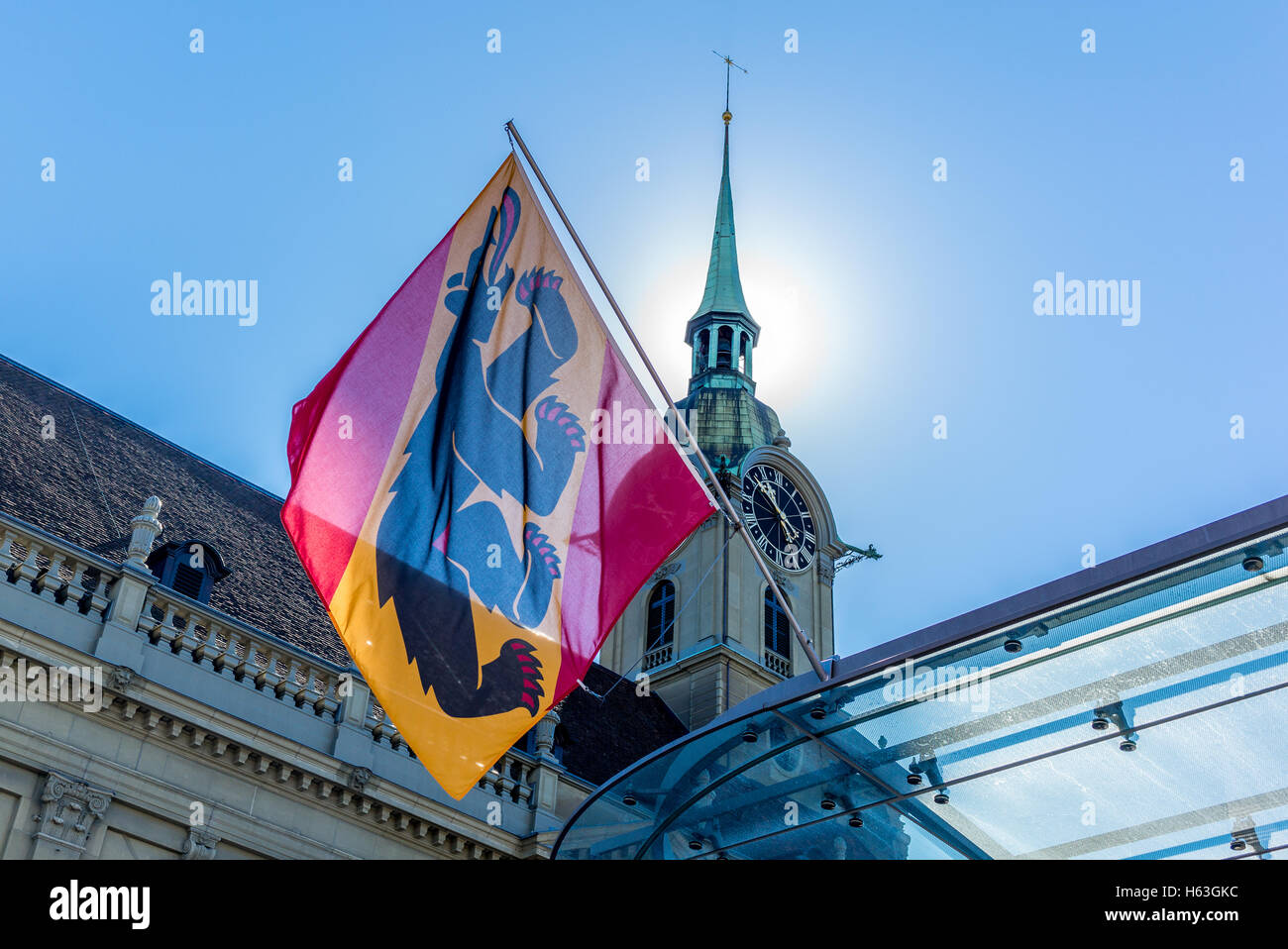 Flag of Canton Bern in Switzerland on the train station square - 1 ...
