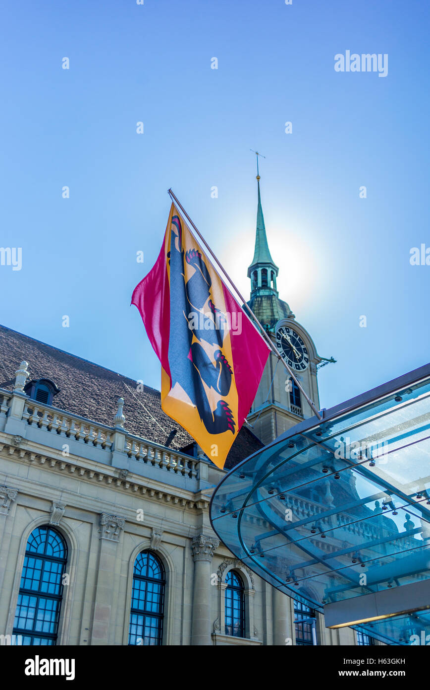 Flag of Canton Bern in Switzerland on the train station square - 2 ...