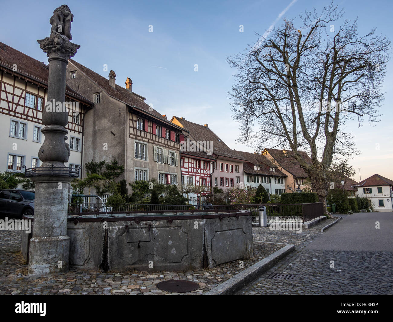 Historical village fountain in regensberg near zurich hi-res stock ...