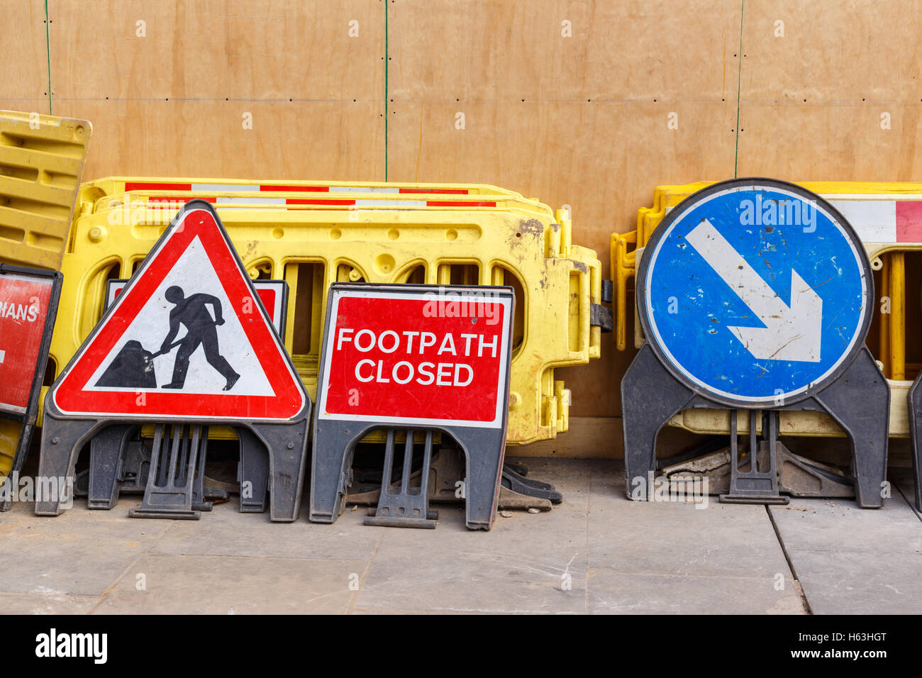 Piles of road and street signs by edge of a road. In Nottingham ...