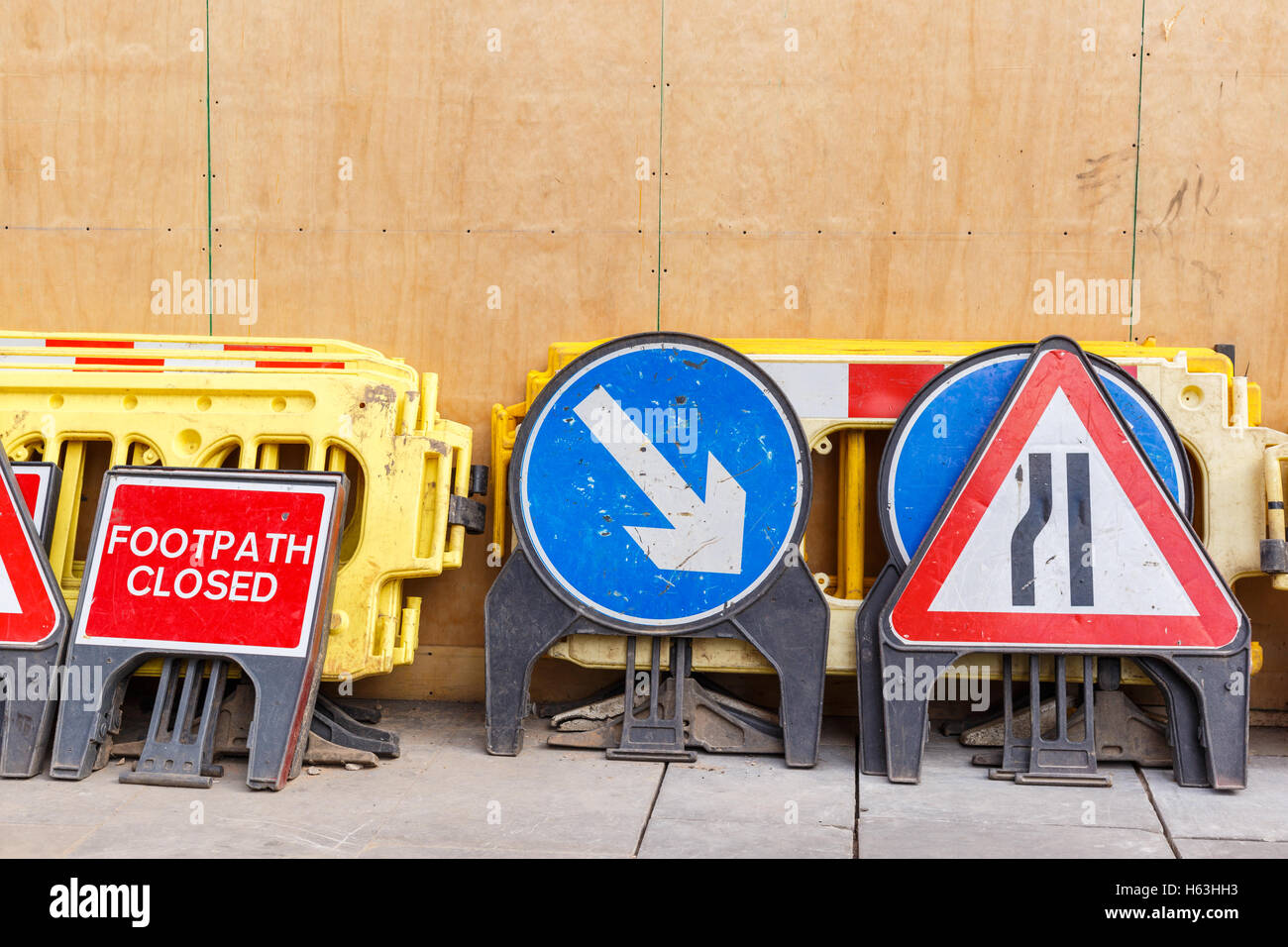 Piles of road and street signs by edge of a road. In Nottingham ...