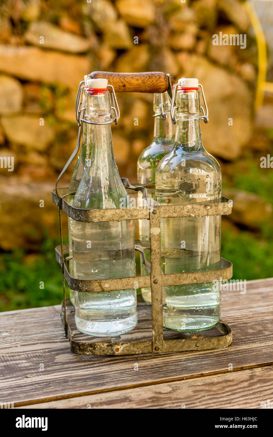 Bottles of cold spring water during summer in the mountains in Corsica ...