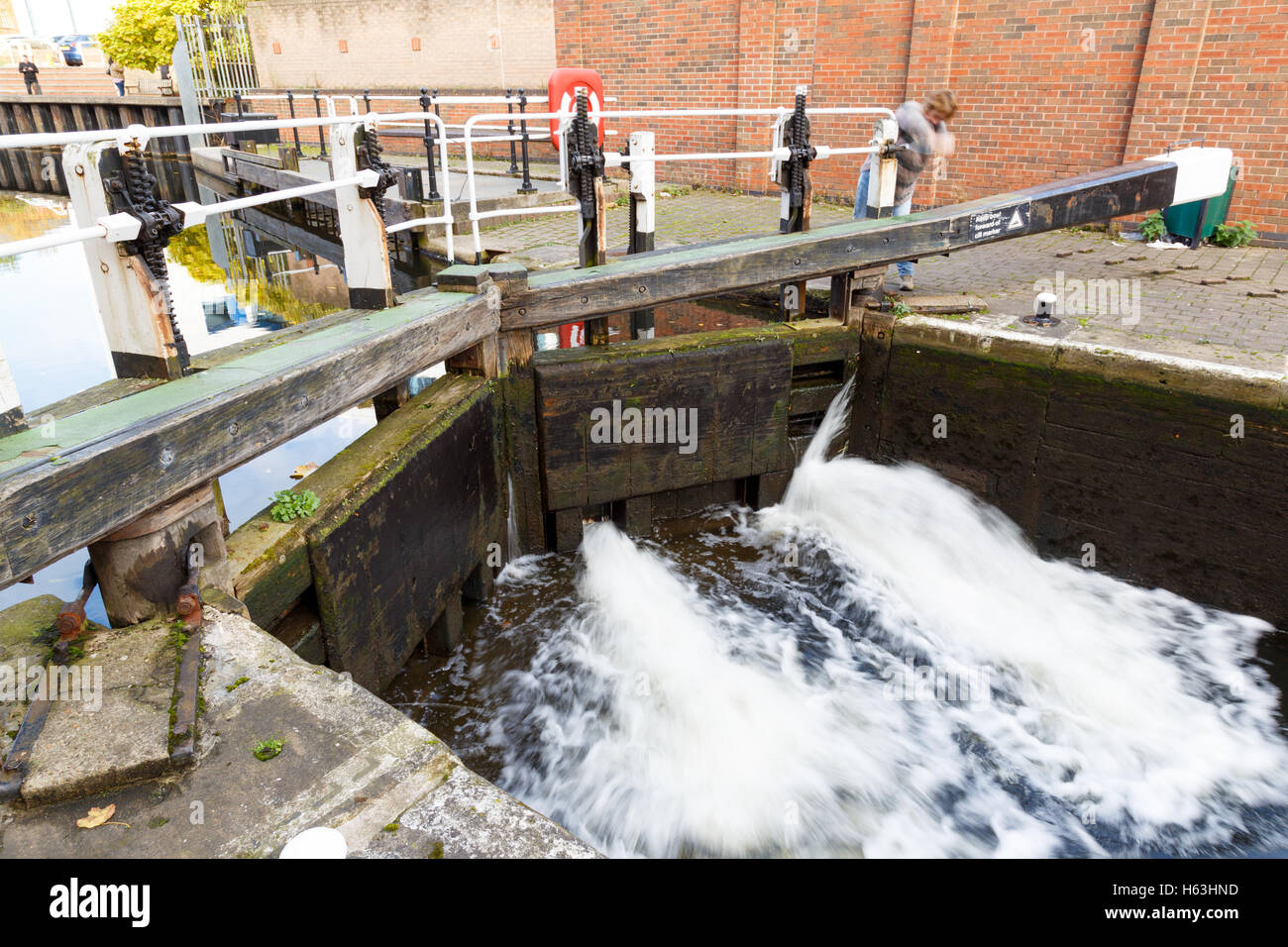 A woman operating a pound lock at Nottingham Canal. In Nottingham ...