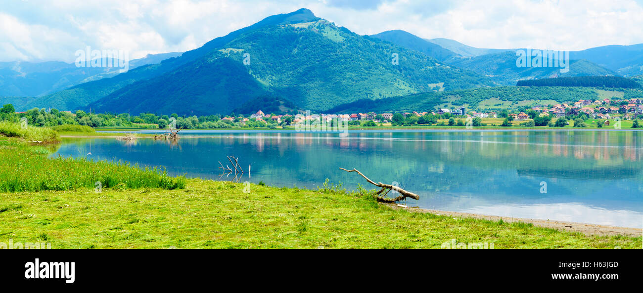 Panoramic view of Plav Lake and the Plav town in southern Montenegro ...