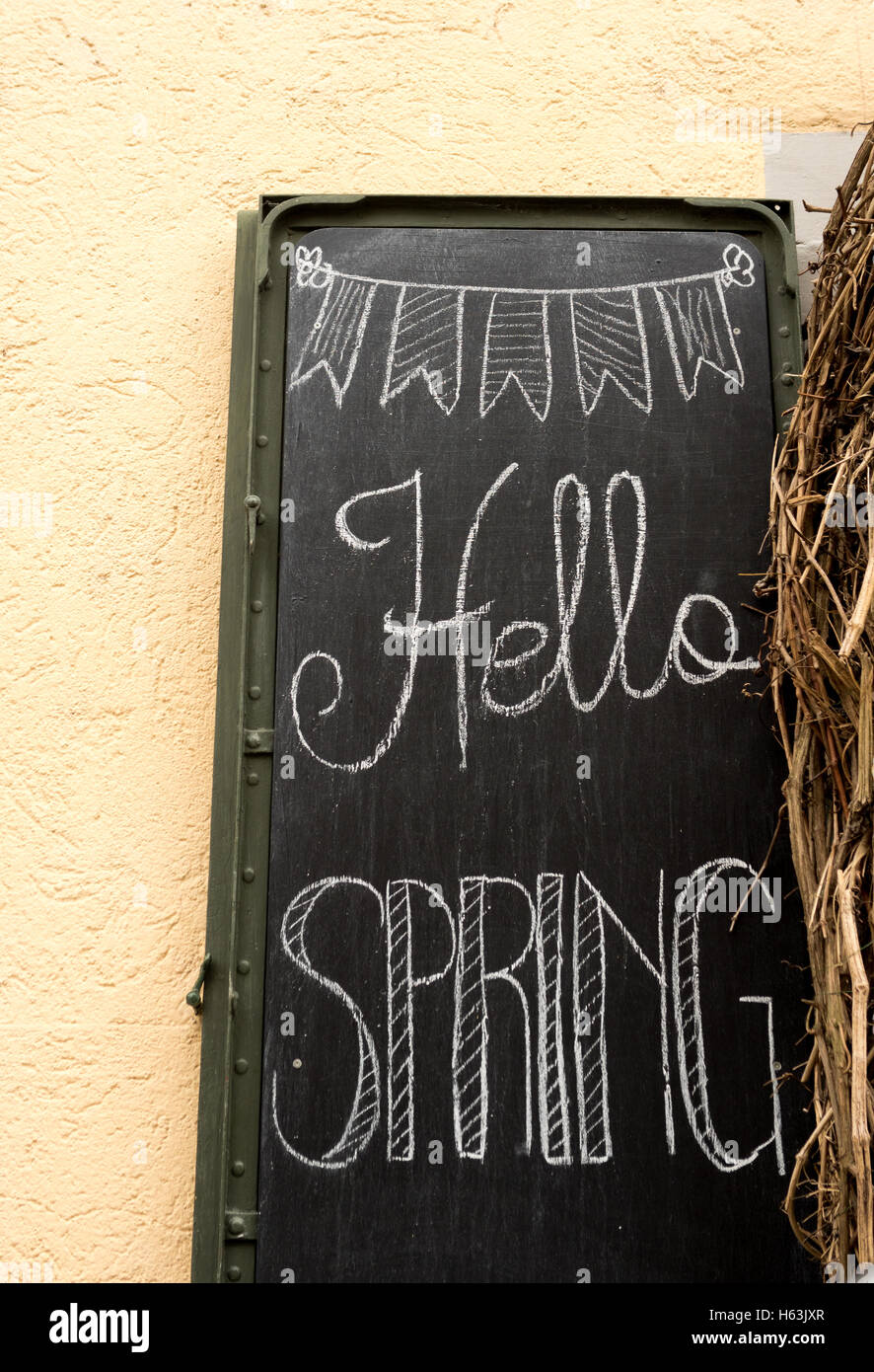 Sign welcoming Spring Stock Photo - Alamy