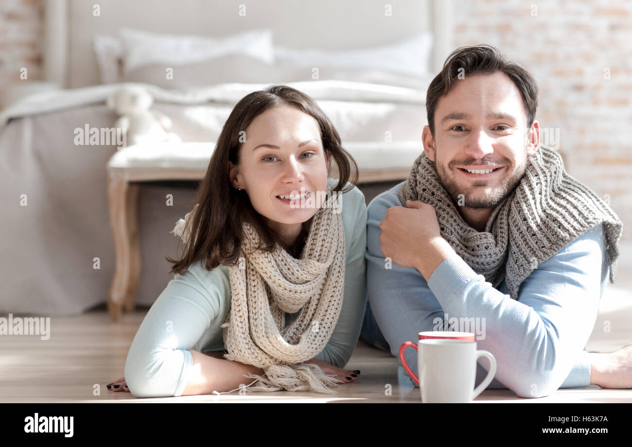 Joyful positive couple smiling Stock Photo - Alamy