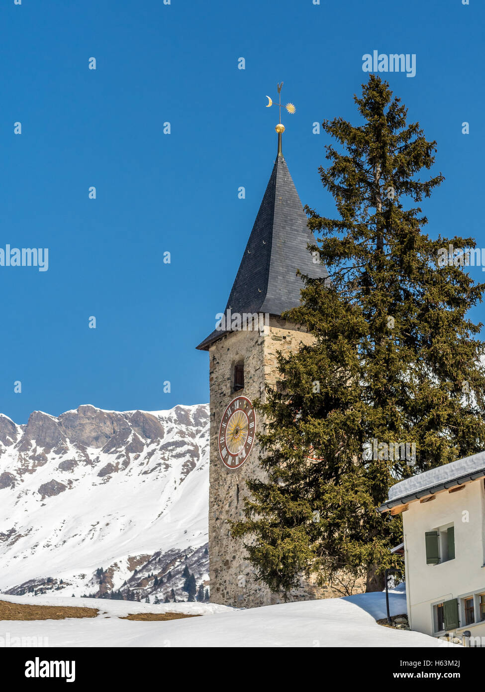 Medieval bell tower of a small village church in the Swiss Alps - 1 ...