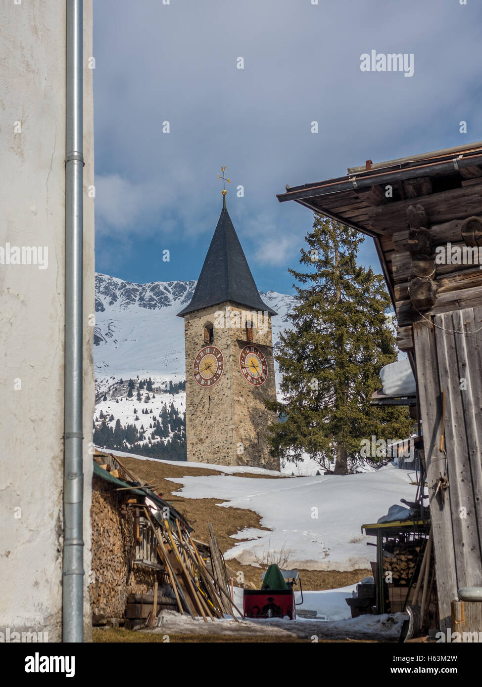 Medieval bell tower of a small village church in the Swiss Alps - 3 ...