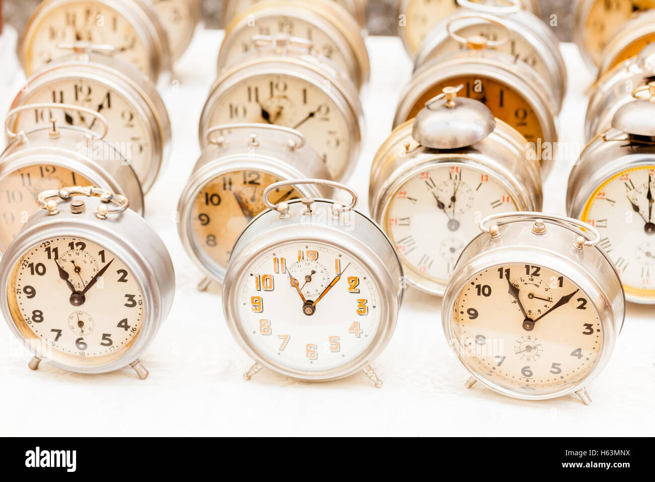 Group of vintage clocks at market Stock Photo - Alamy