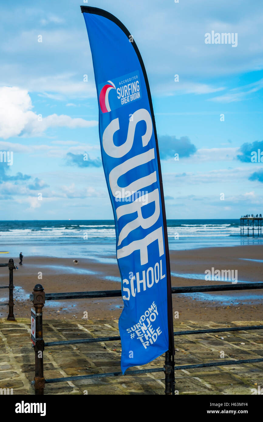 Banner promoting the Saltburn Surf School North Yorkshire UK Stock ...