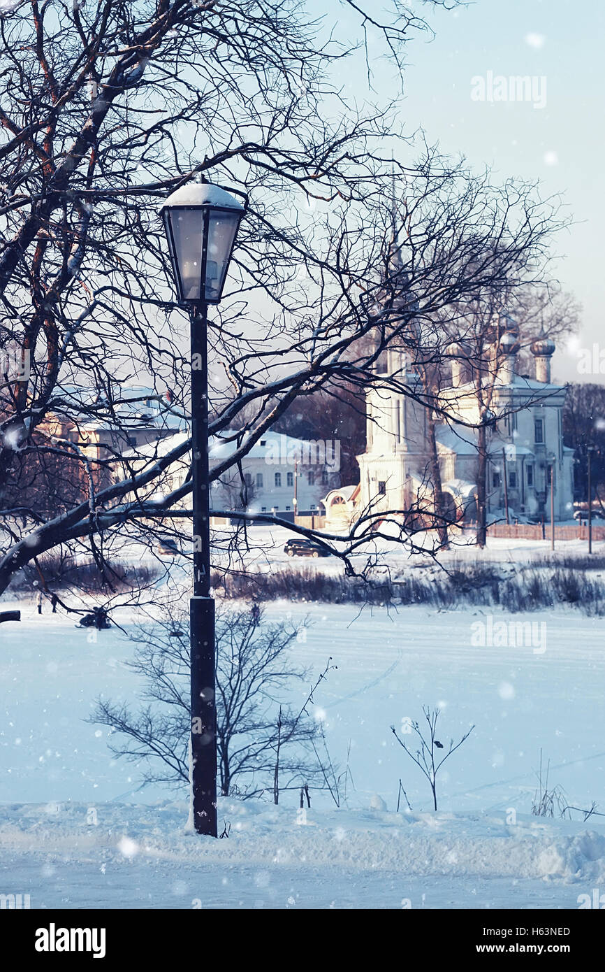 Winter light street and tree Stock Photo - Alamy