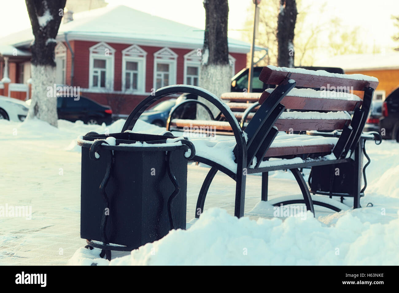 Winter street bench retro Stock Photo - Alamy