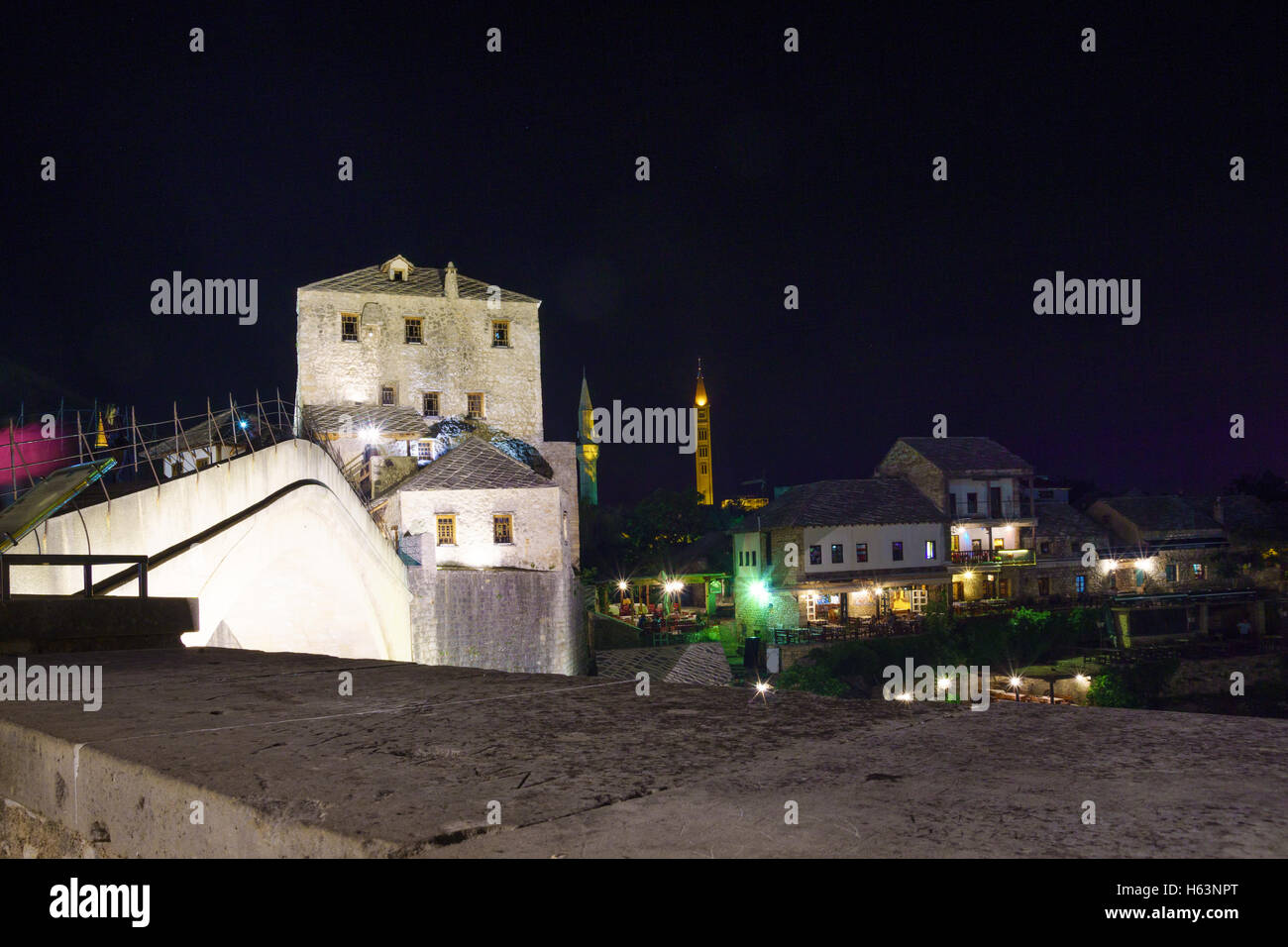 The old city and the restored Old Bridge (Stari Most) at night, in ...