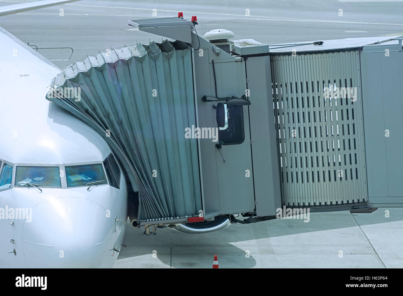 aircraft at the finger in the airport Stock Photo - Alamy