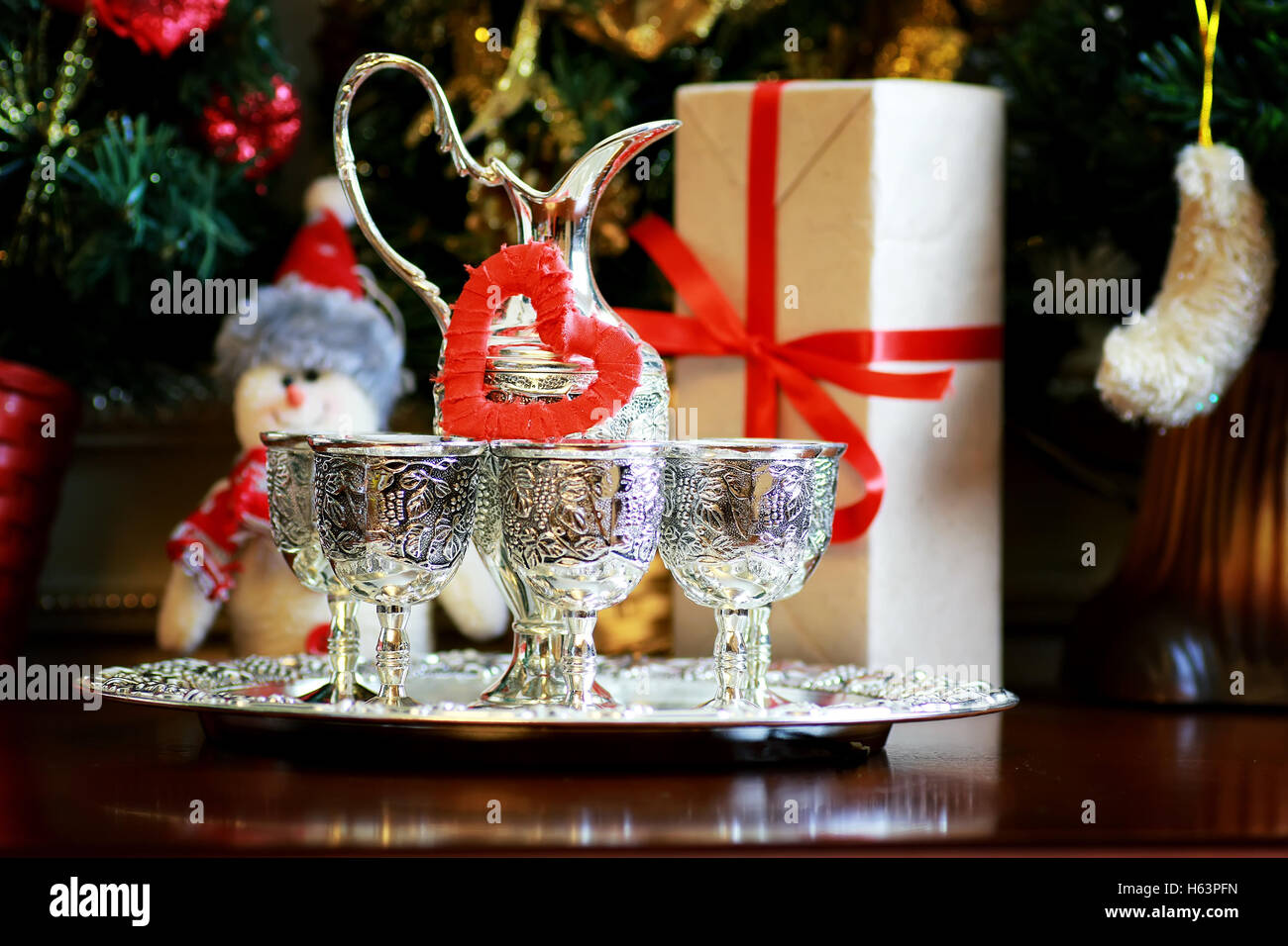 silver carafe with wine glasses heart shape Stock Photo - Alamy