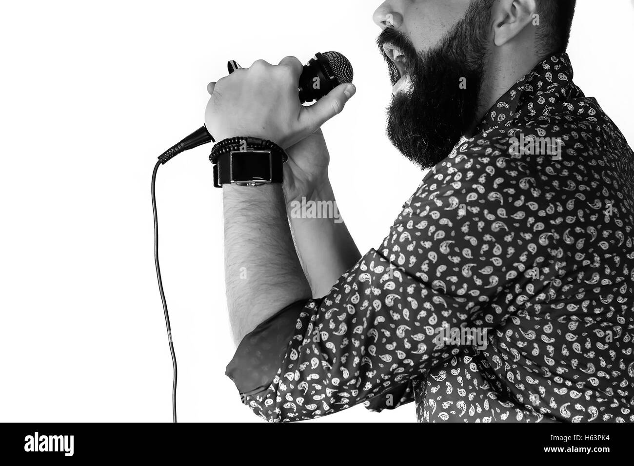 Microphone isolated man hand Stock Photo - Alamy