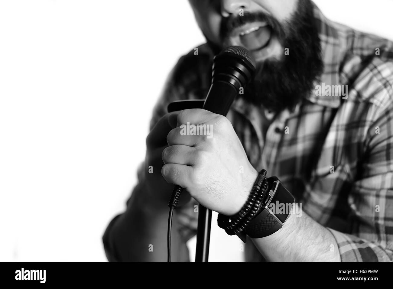 Microphone isolated man hand Stock Photo - Alamy