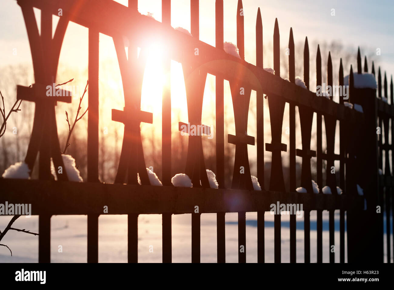fence with spikes sun Stock Photo - Alamy