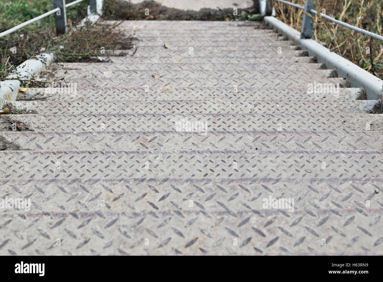 metal ladder down Stock Photo - Alamy