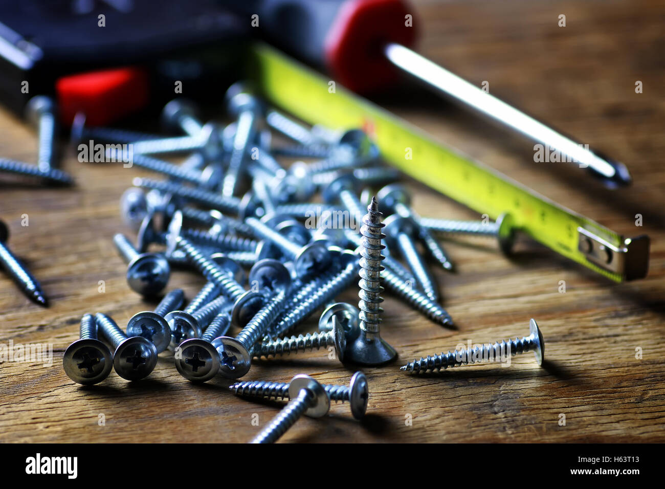 screws and screwdriver stack Stock Photo - Alamy