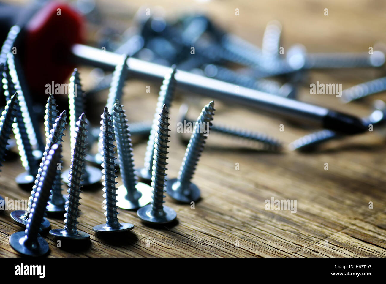 screws and screwdriver stack Stock Photo - Alamy
