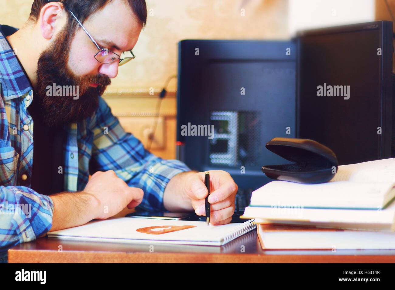 male work computer pen write Stock Photo - Alamy