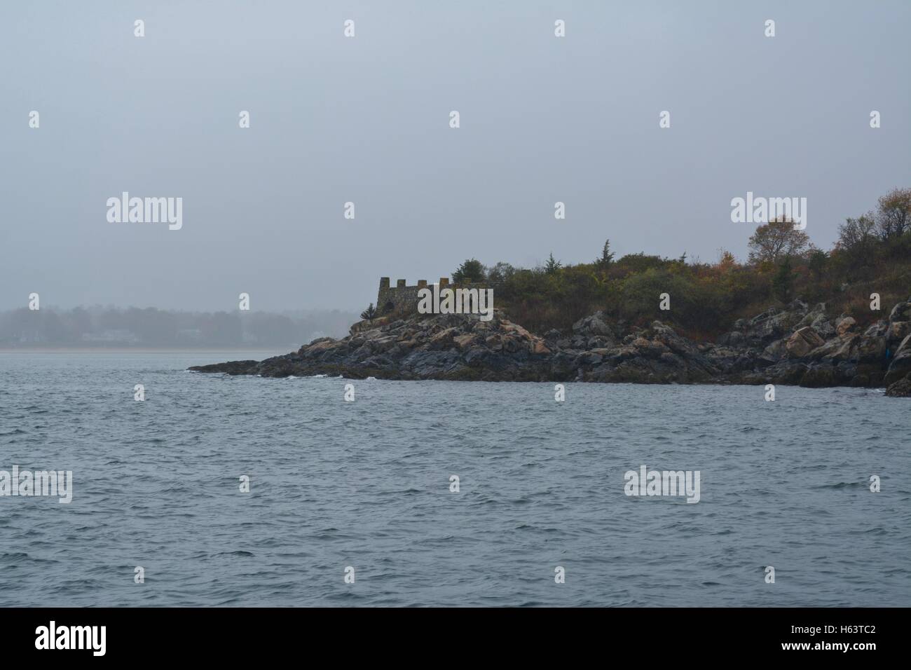 The rocky shoreline of Misery island and ruins in Salem Harbor, north ...