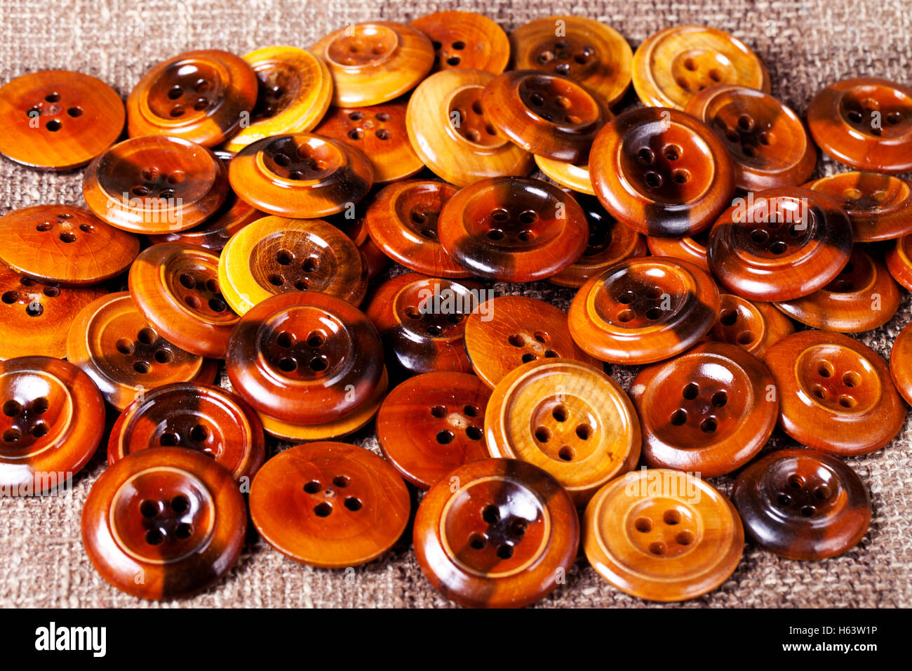 a Vintage wooden buttons background Stock Photo - Alamy