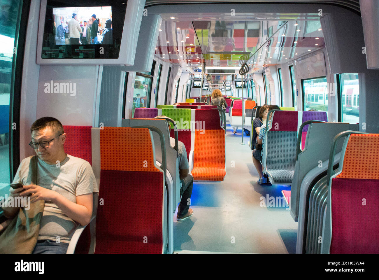 Paris, France, Chinese Man Sitting, Riding Alone on RER A SNCF Subway ...