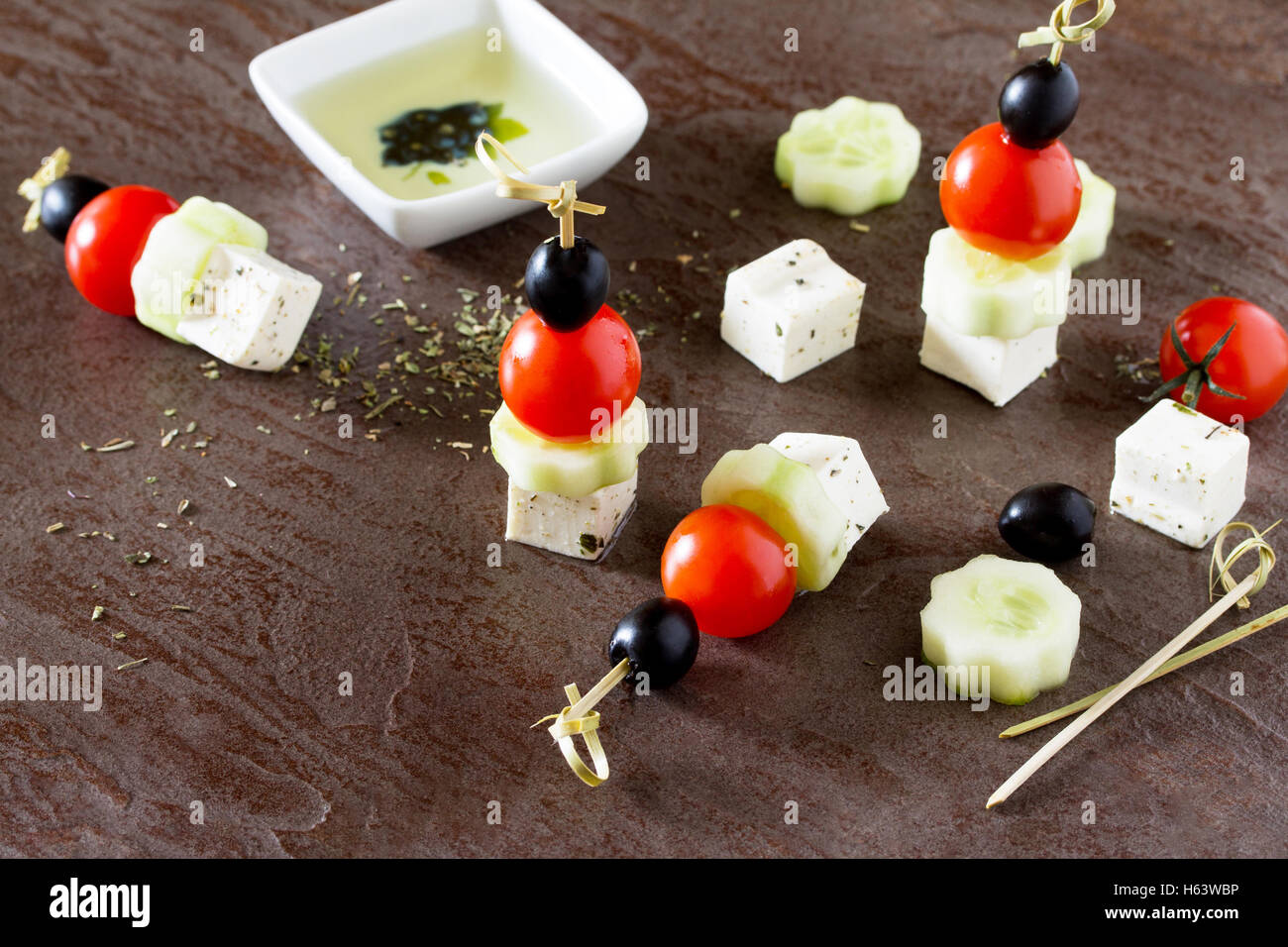 Appetizer canape. Greek salad with fresh vegetables, feta cheese and ...