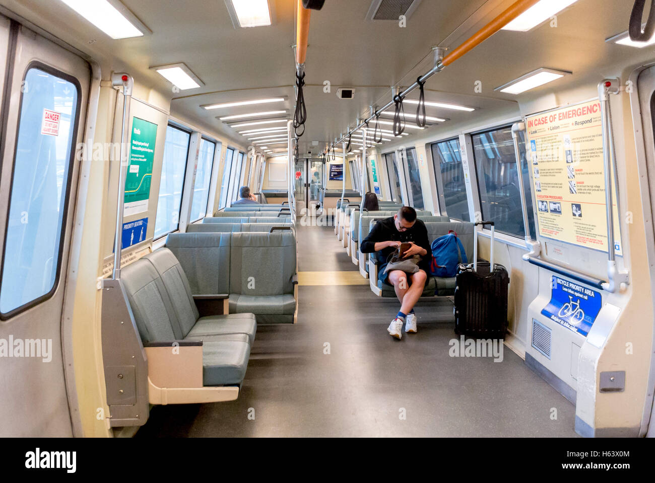 San Francisco, CA, USA, Man sitting alone in empty train BART Subway ...