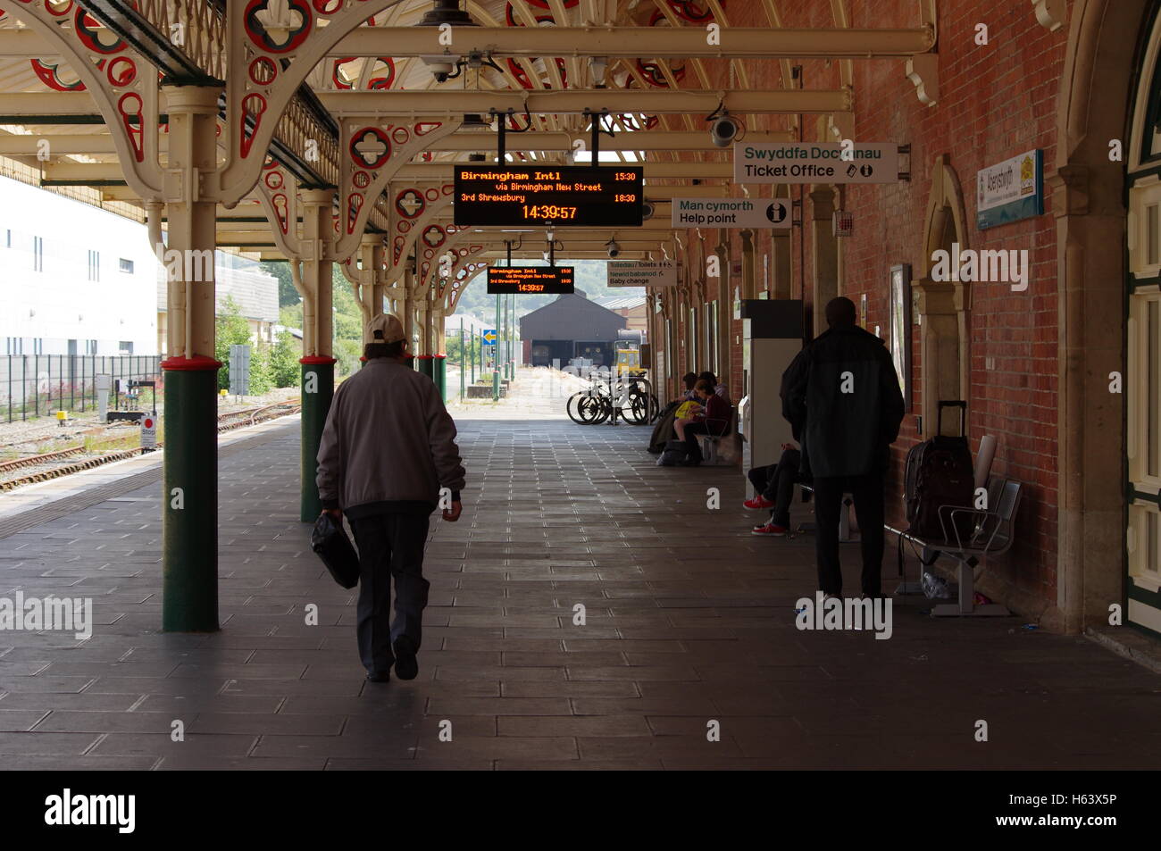 A passengers get to the platform early waiting for the next train at ...