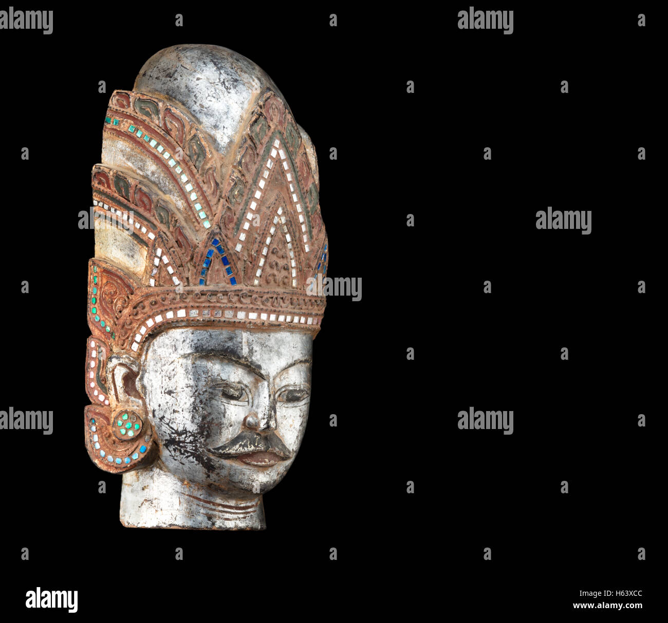 Asian king sculpture painted Stock Photo - Alamy