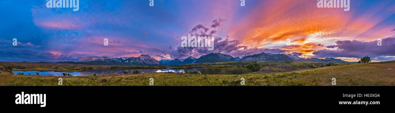 The sunset colours over Waterton Lakes National Park and Maskinonge ...