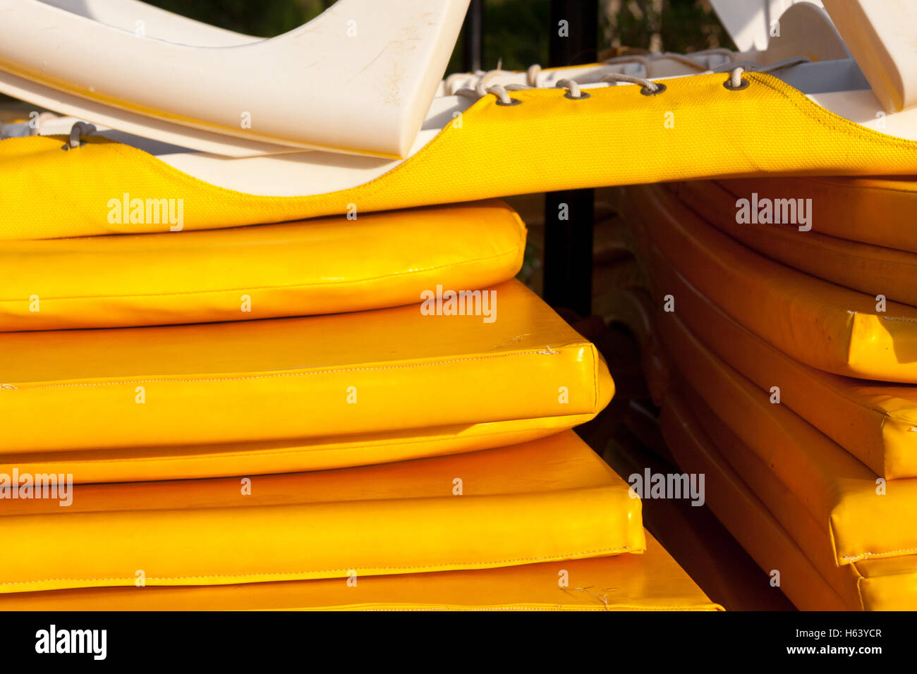 yellow sun bed mattresses Stock Photo - Alamy