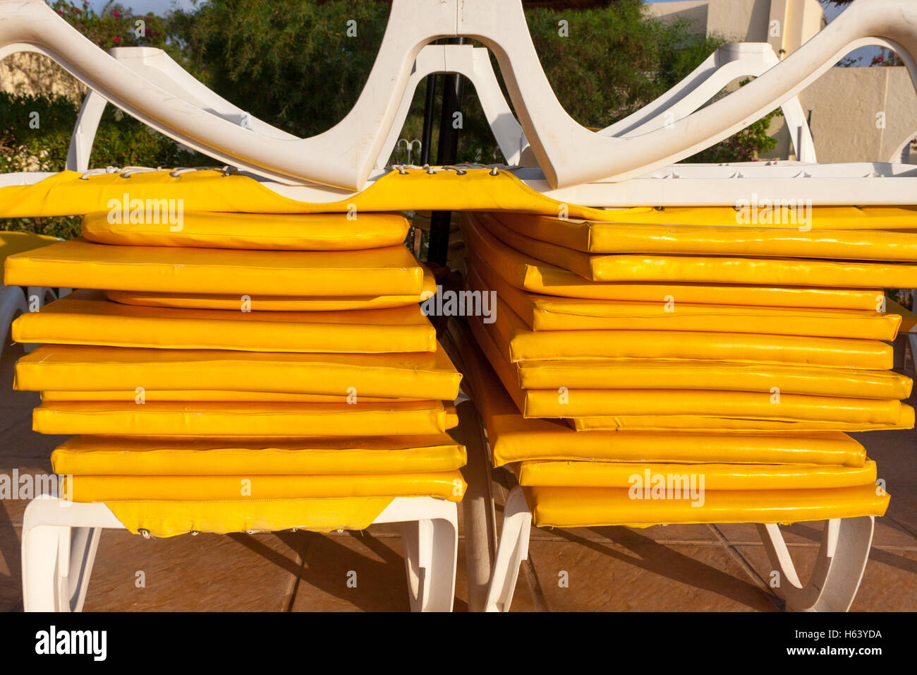 yellow sun bed mattresses Stock Photo - Alamy
