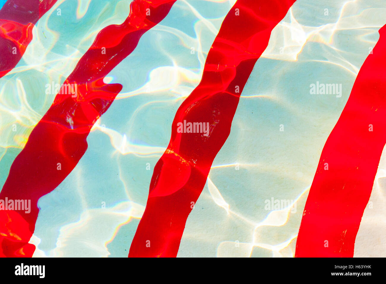 red and white striped swimming pool steps Stock Photo - Alamy