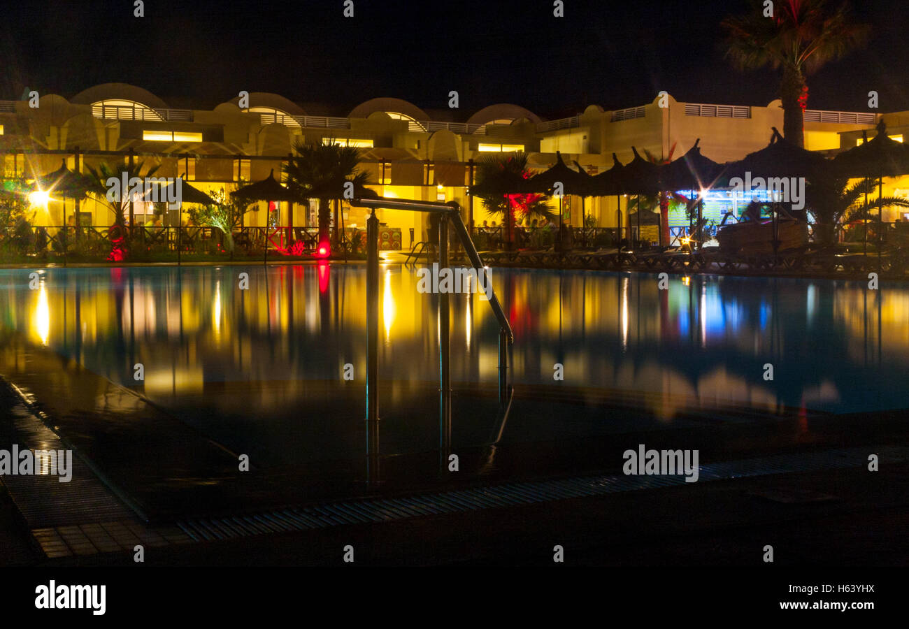 hope complex reflected in swimming pool at night Stock Photo - Alamy