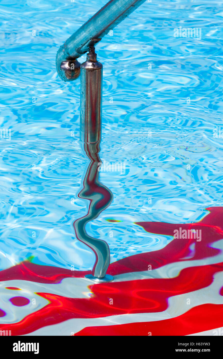 red and white striped swimming pool steps Stock Photo - Alamy