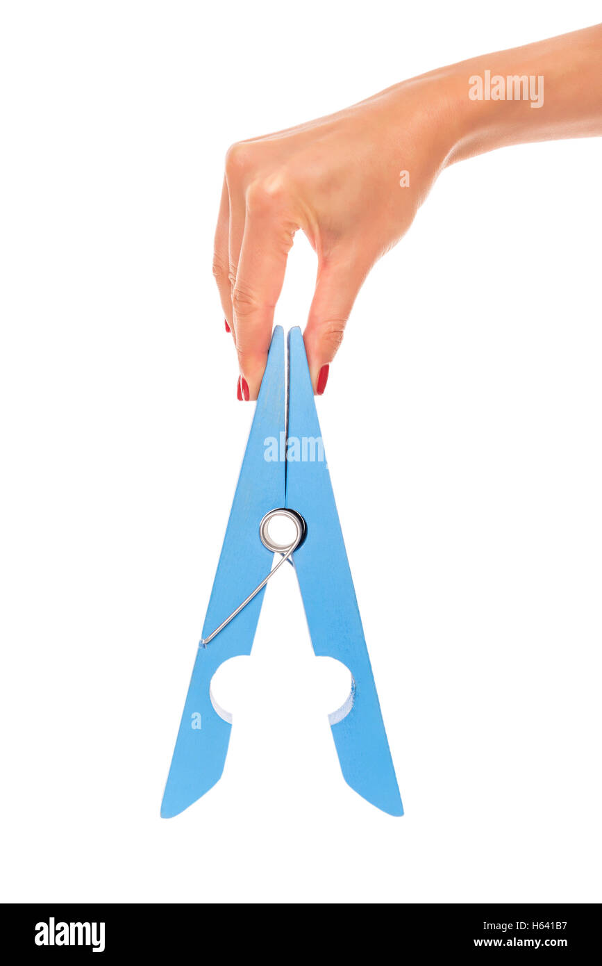 Large clothes pin in his hand Stock Photo - Alamy