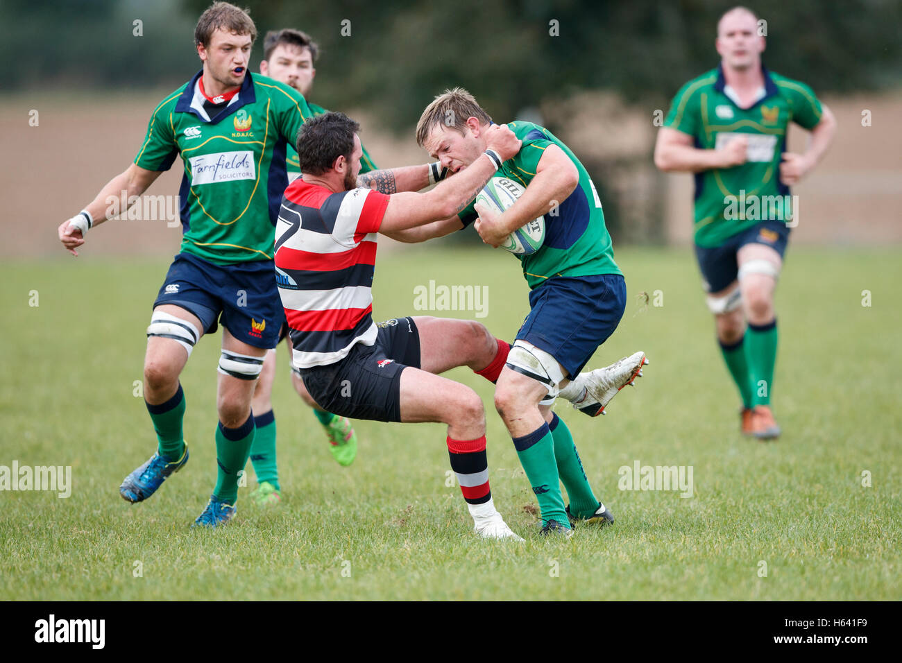 Action tackle grabbing holding football hi-res stock photography and ...