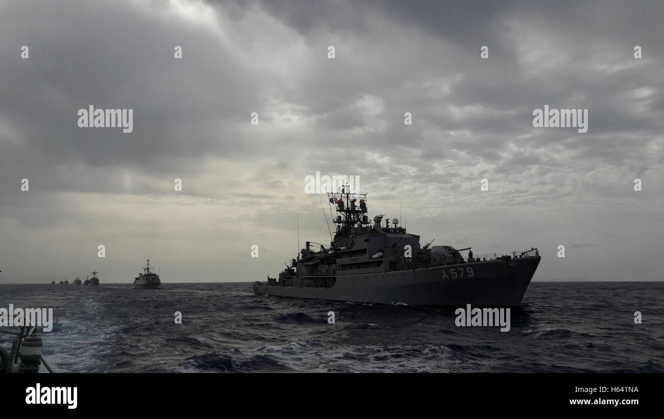 Column formation of military ships Stock Photo - Alamy