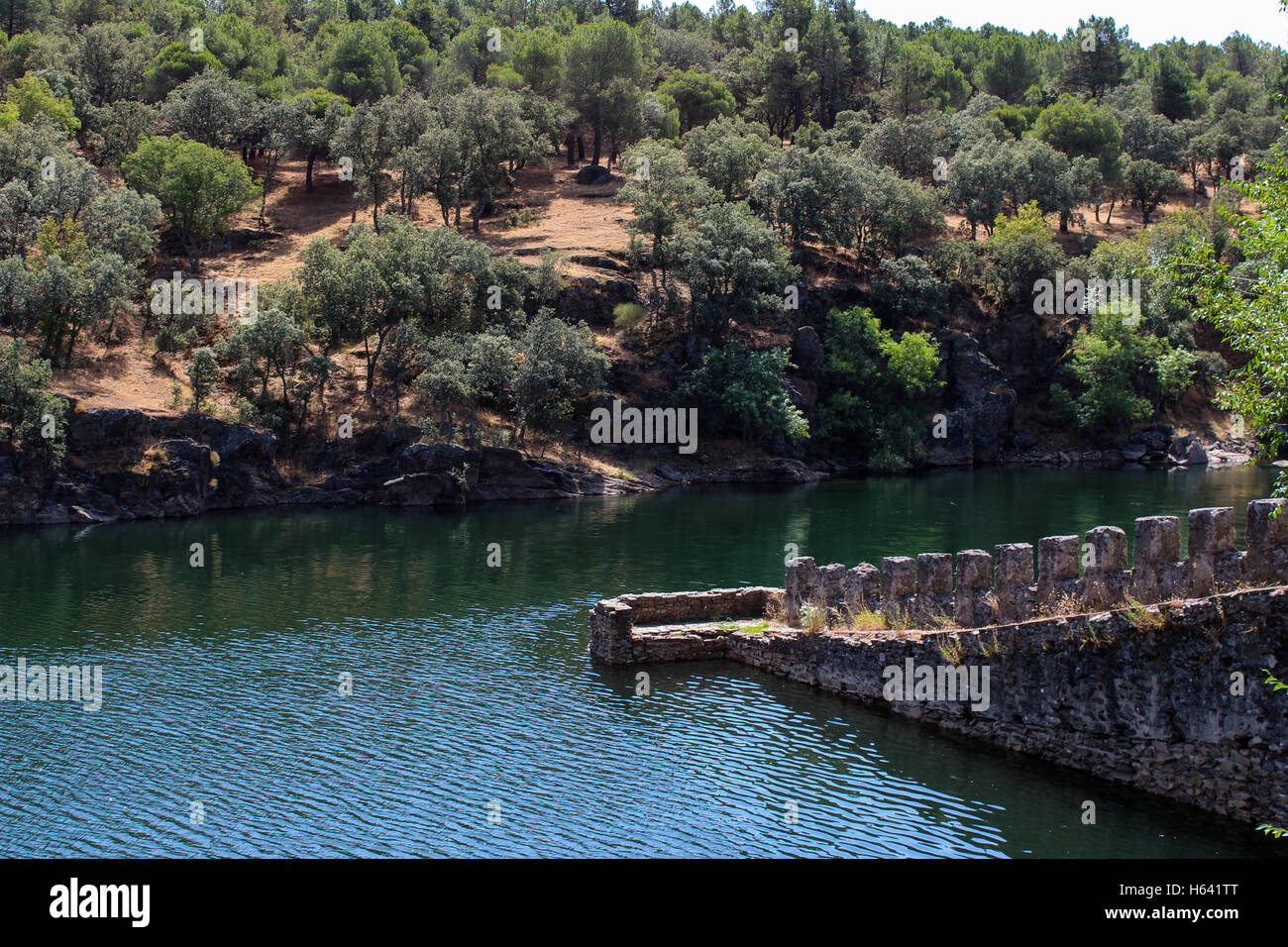 A view of a stone dock in a river Stock Photo - Alamy