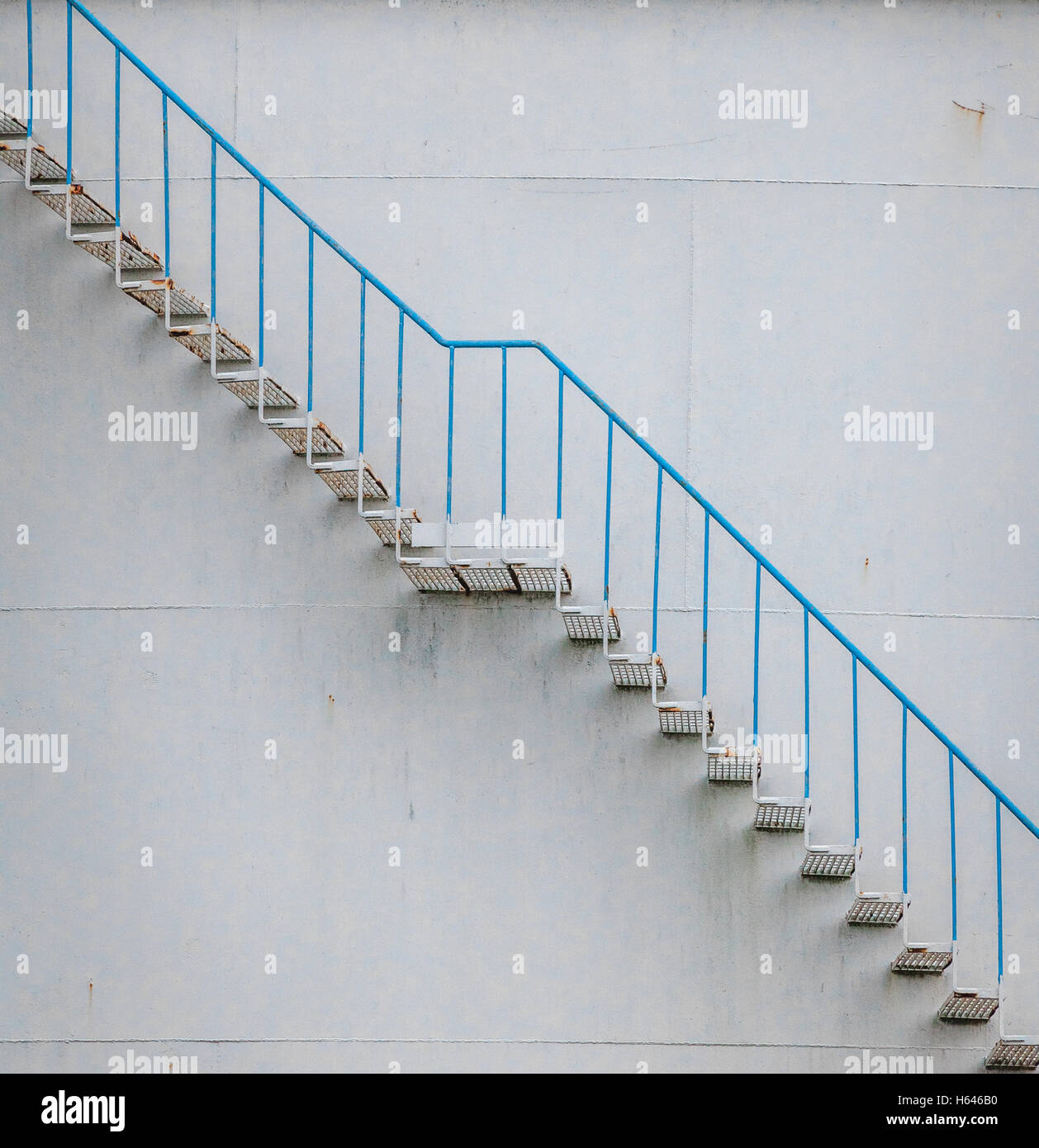 Steps with Bright Blue Handrail on Side of Fuel Storage Tank Stock ...