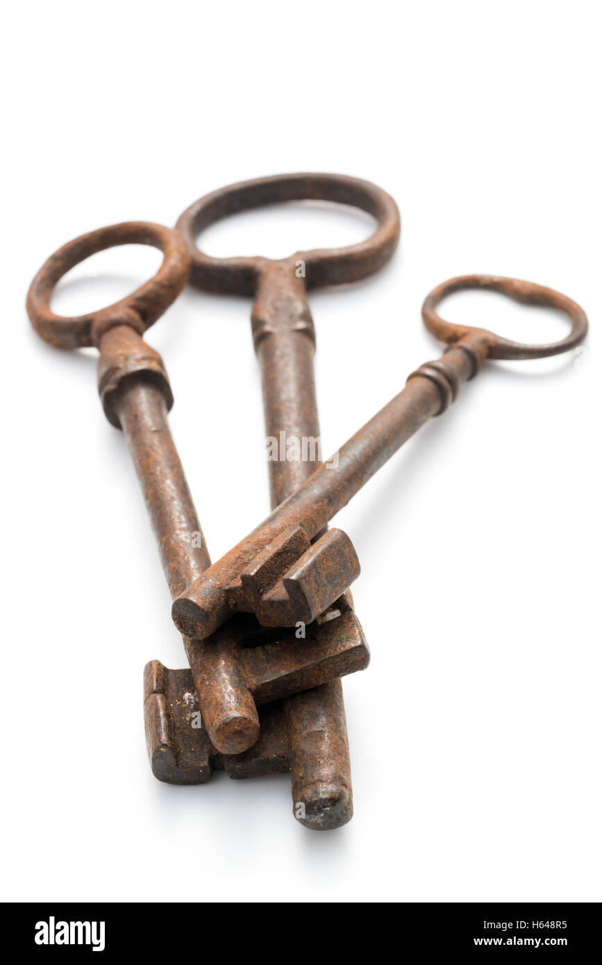 three old keys isolated on white background Stock Photo - Alamy