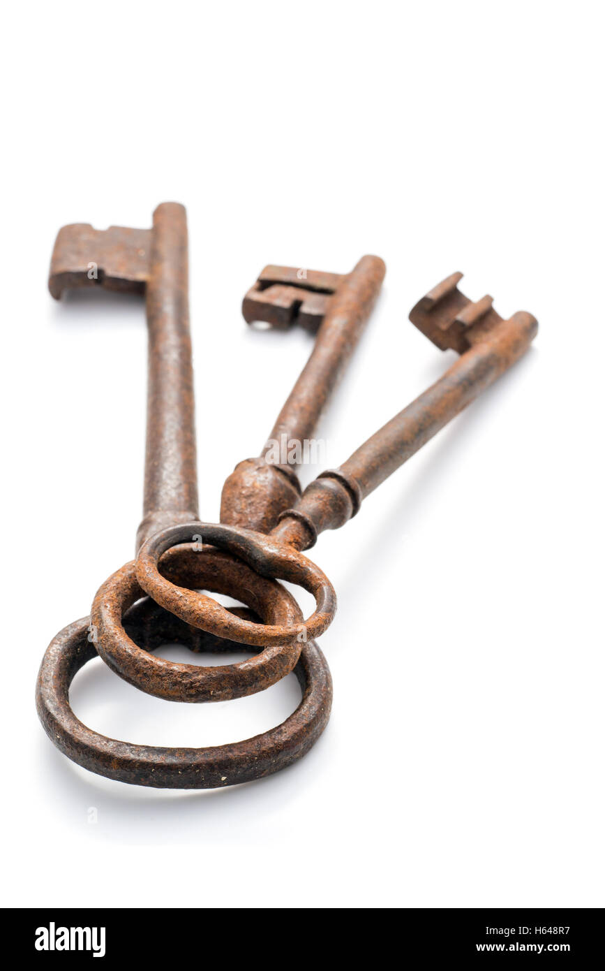 three old keys isolated on white background Stock Photo - Alamy