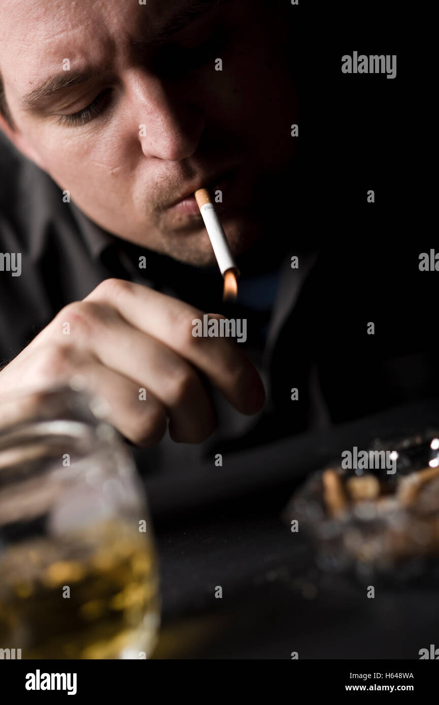 Old man smoking beer hi-res stock photography and images - Alamy
