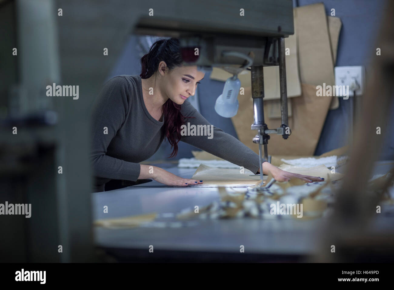 Fashion designer preparing cloth in factory Stock Photo - Alamy
