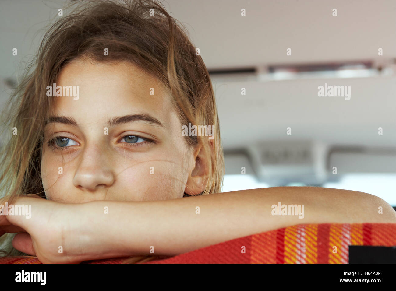 Portrait of serious teenage girl inside car Stock Photo - Alamy