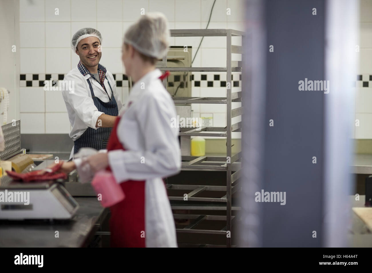 Female butcher smiling in butchery hi-res stock photography and images ...